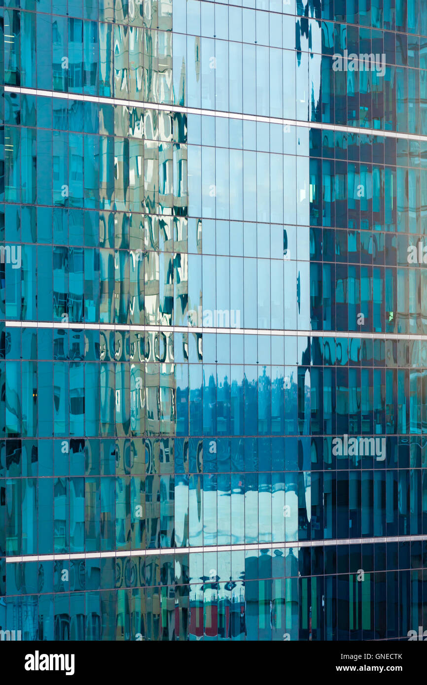 Reflections in modern glass-walled building facade Stock Photo - Alamy