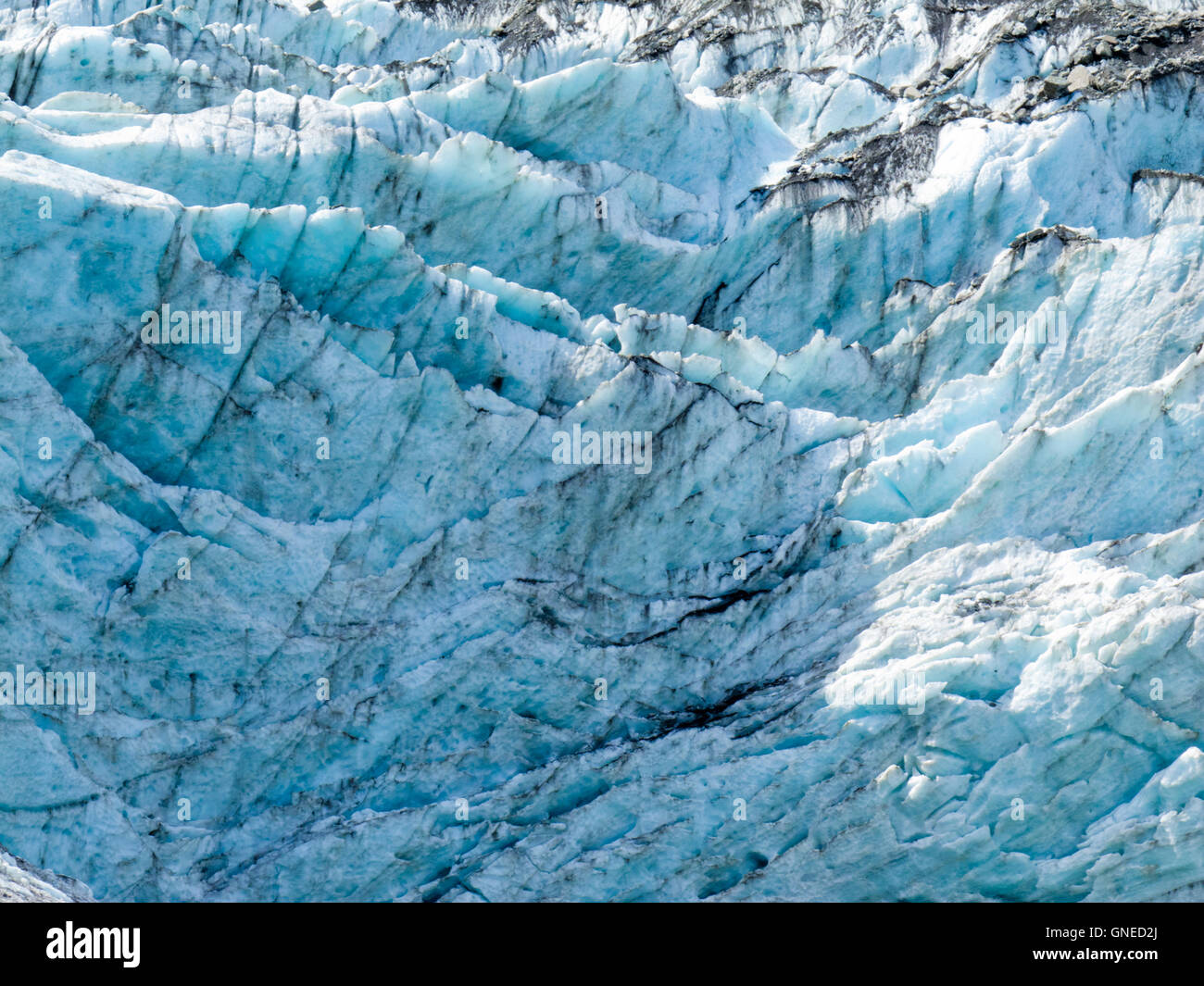 Blue glacier ice background texture pattern Stock Photo - Alamy