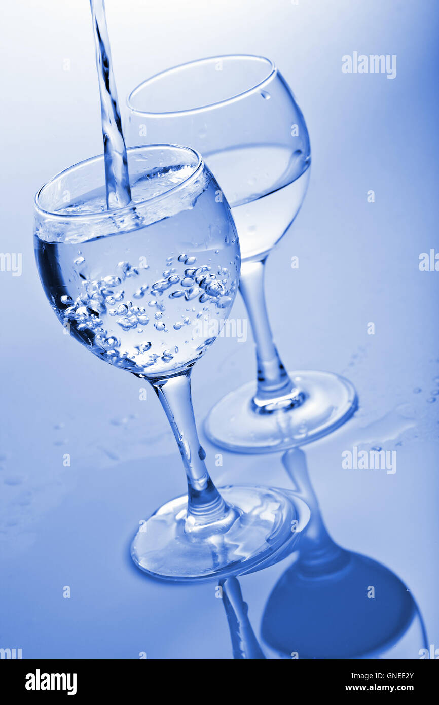 pure water splashing into glass Stock Photo - Alamy