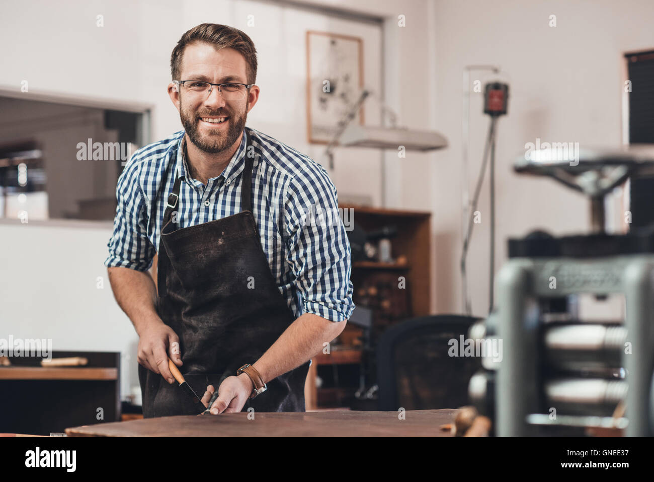 Craftsmanship with a smile Stock Photo - Alamy