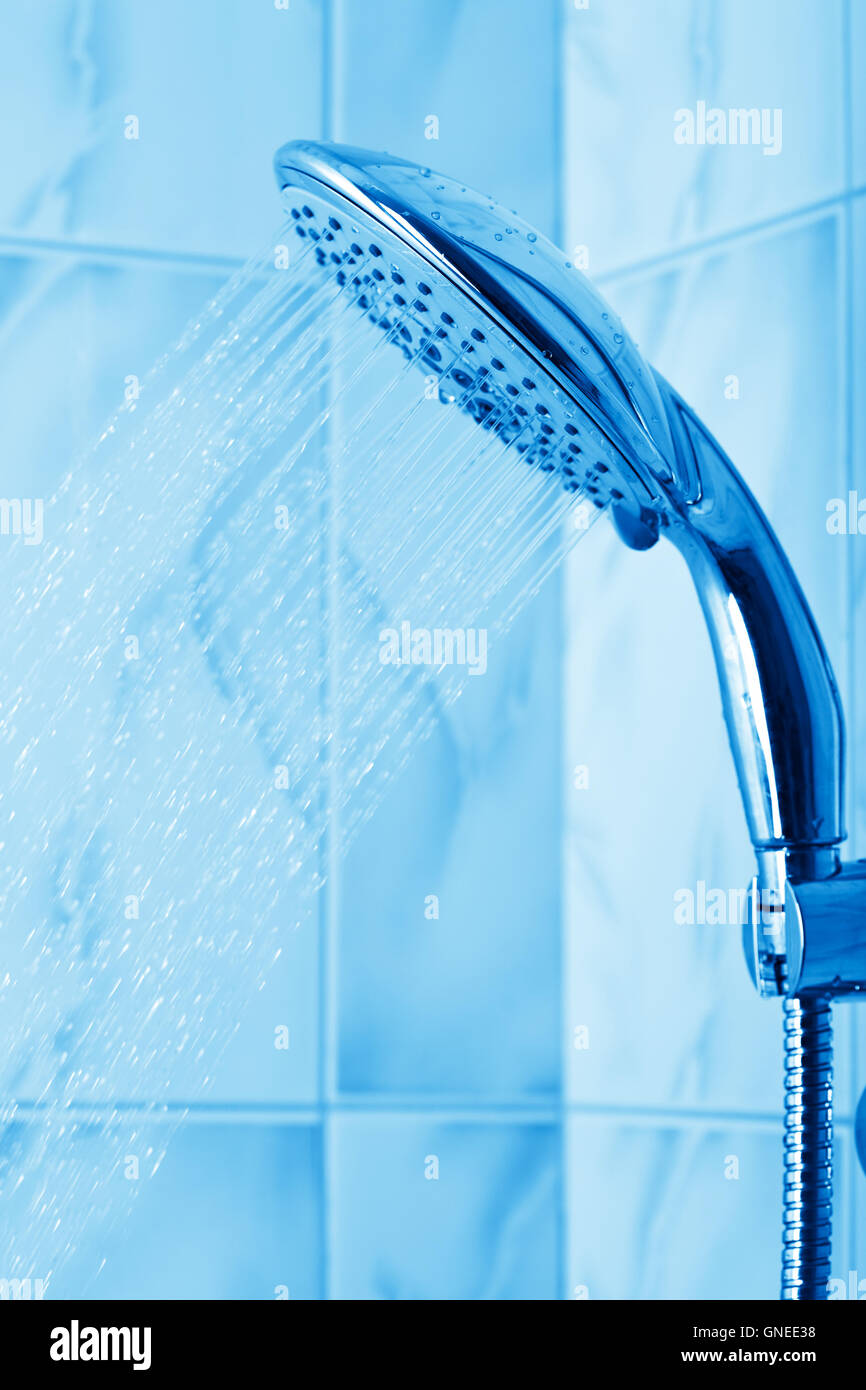 water flowing from metal shower Stock Photo - Alamy