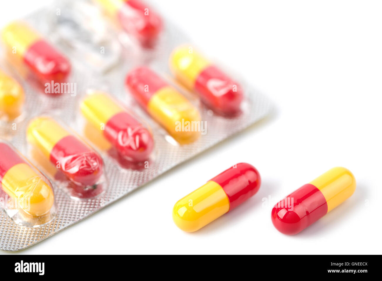 Red and yellow pill hi-res stock photography and images - Alamy