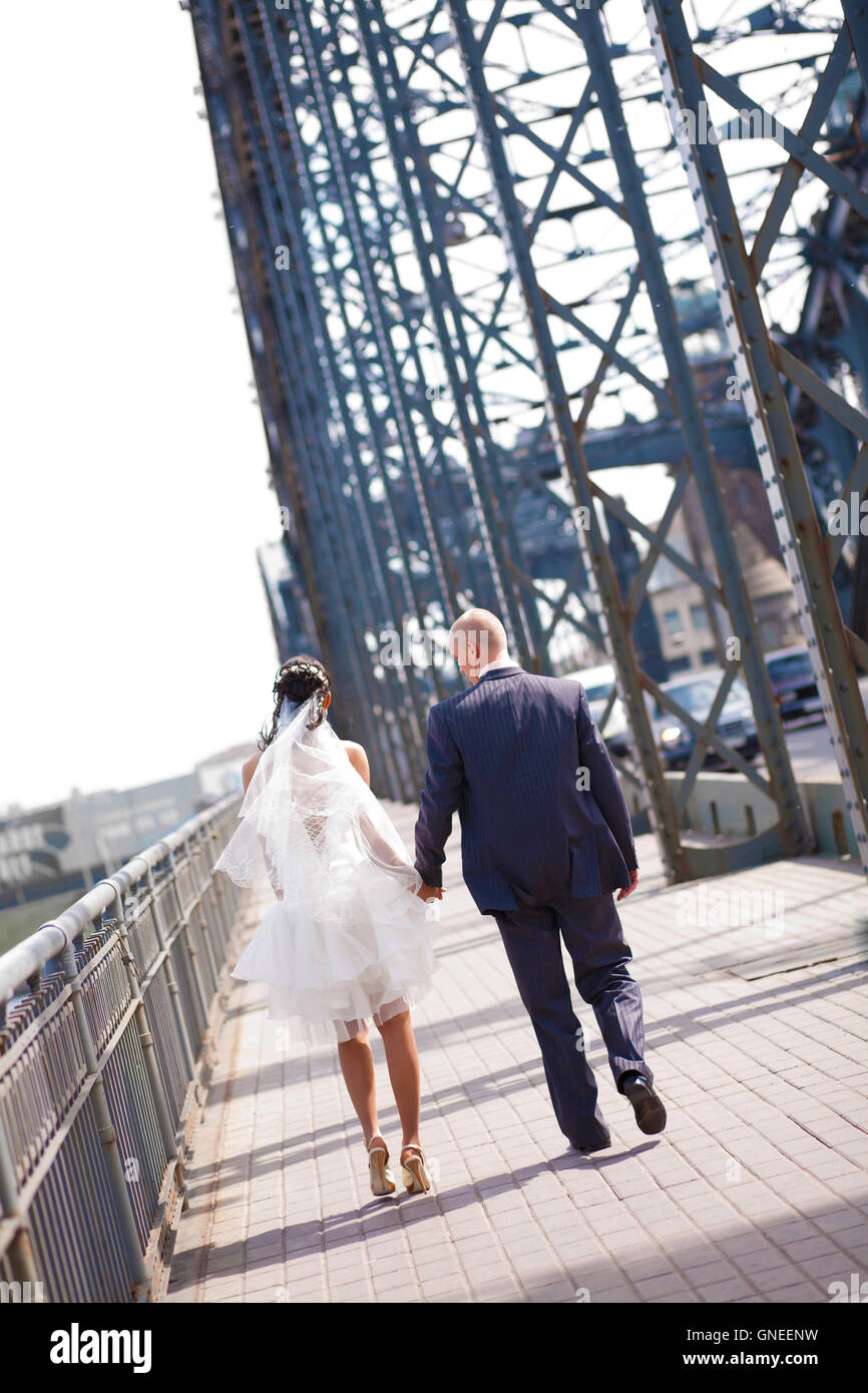 wedding couple walking Stock Photo - Alamy