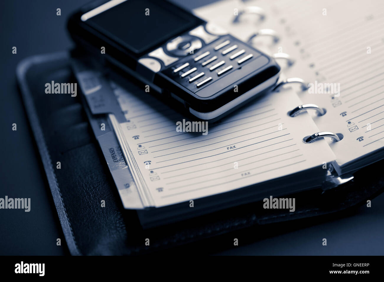 organizer and mobile phone Stock Photo - Alamy