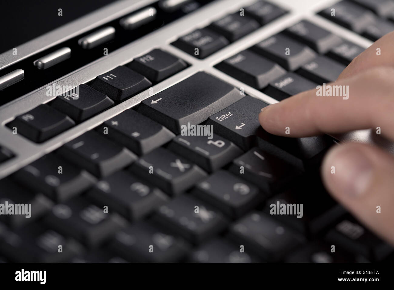 fingers over computer keyboard Stock Photo - Alamy