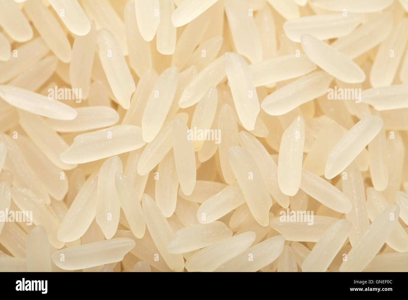 raw rice background Stock Photo - Alamy