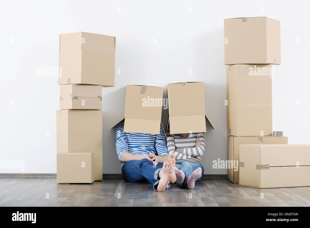 Young couple moving in new home Stock Photo - Alamy