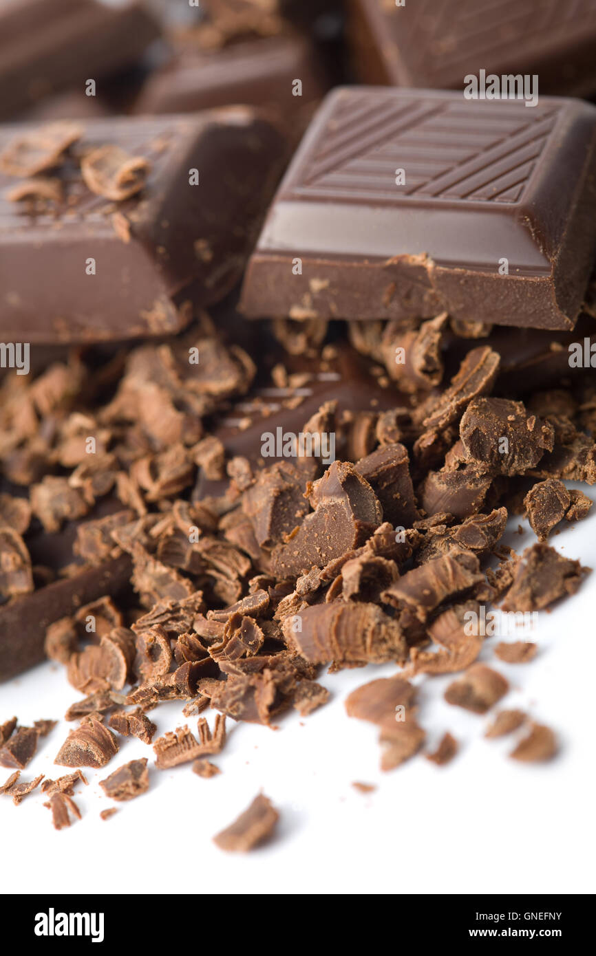 heap of broken chocolate isolated Stock Photo - Alamy