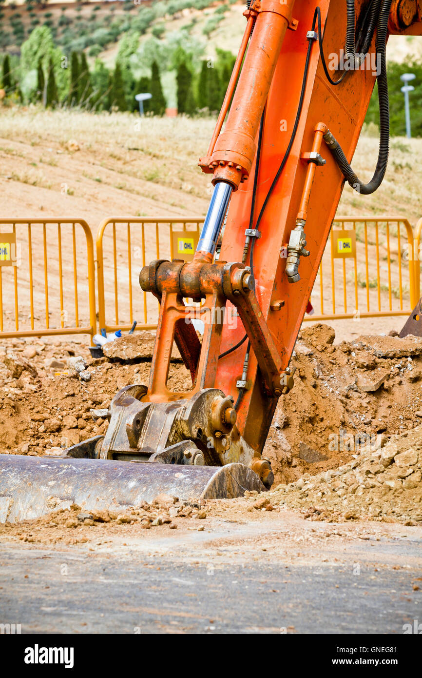 Public street maintenance works, excavator Stock Photo - Alamy