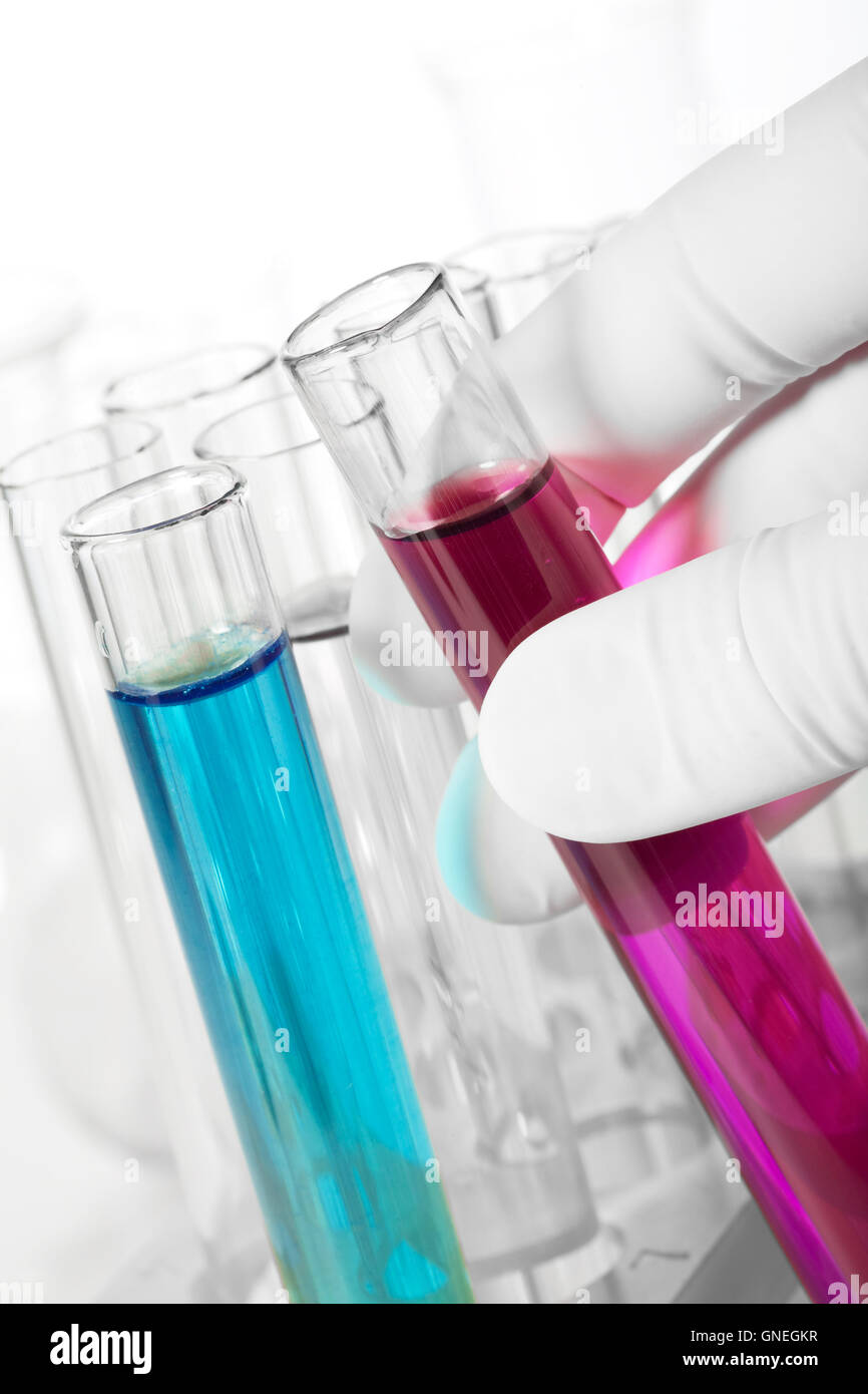hand holding test tube Stock Photo - Alamy