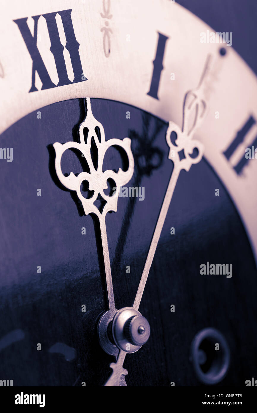 antique clock showing time about twelve Stock Photo - Alamy