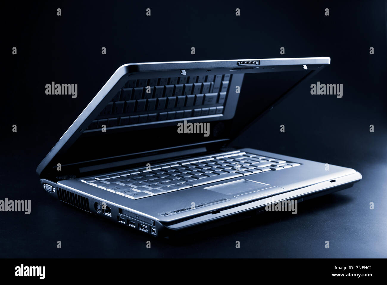 modern notebook over black background Stock Photo - Alamy