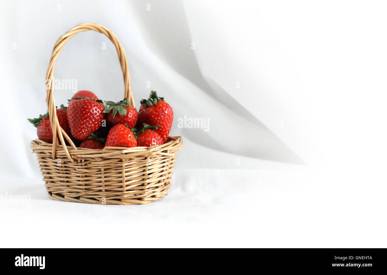 Strawberry In Basket Stock Photo - Alamy