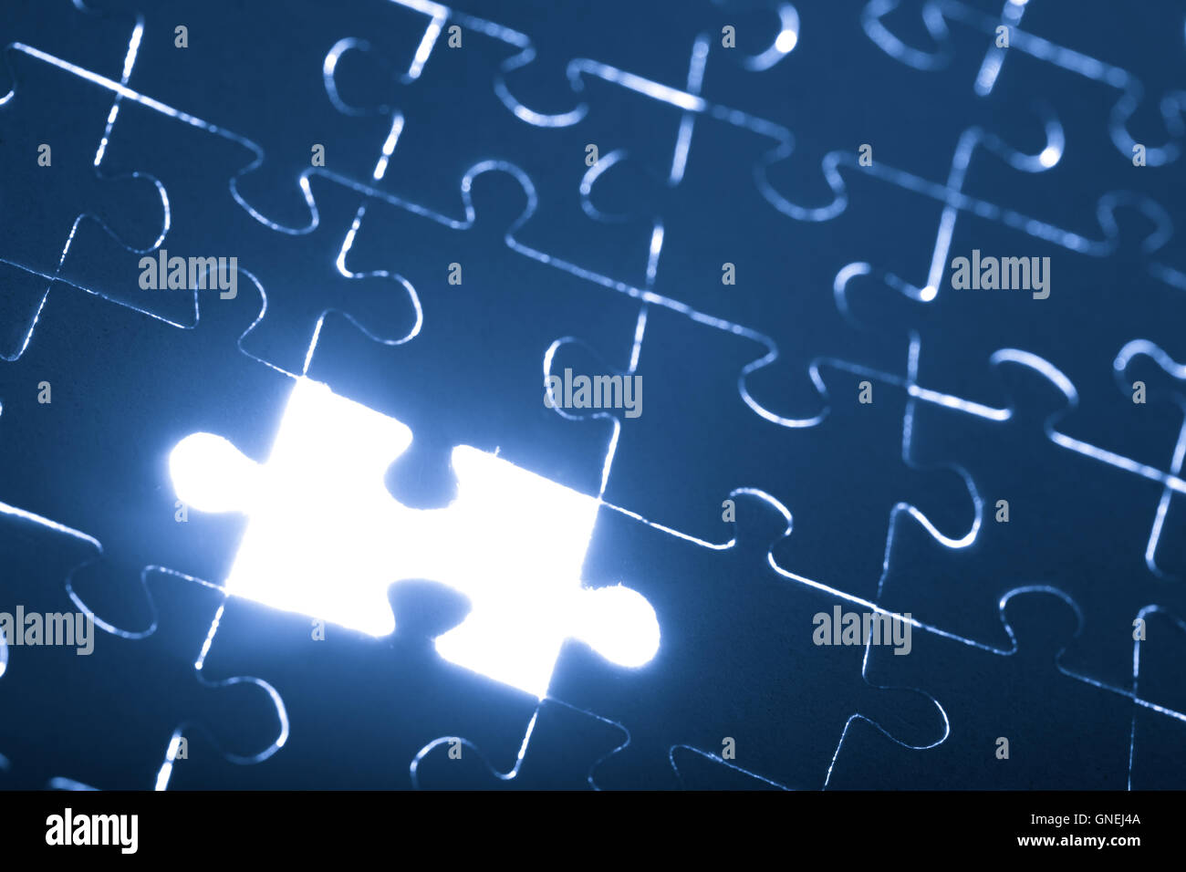 abstract puzzle background with one missing piece Stock Photo - Alamy