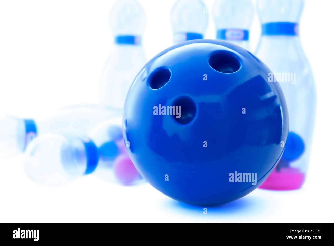 pins and ball for play in bowling on a white background Stock Photo - Alamy
