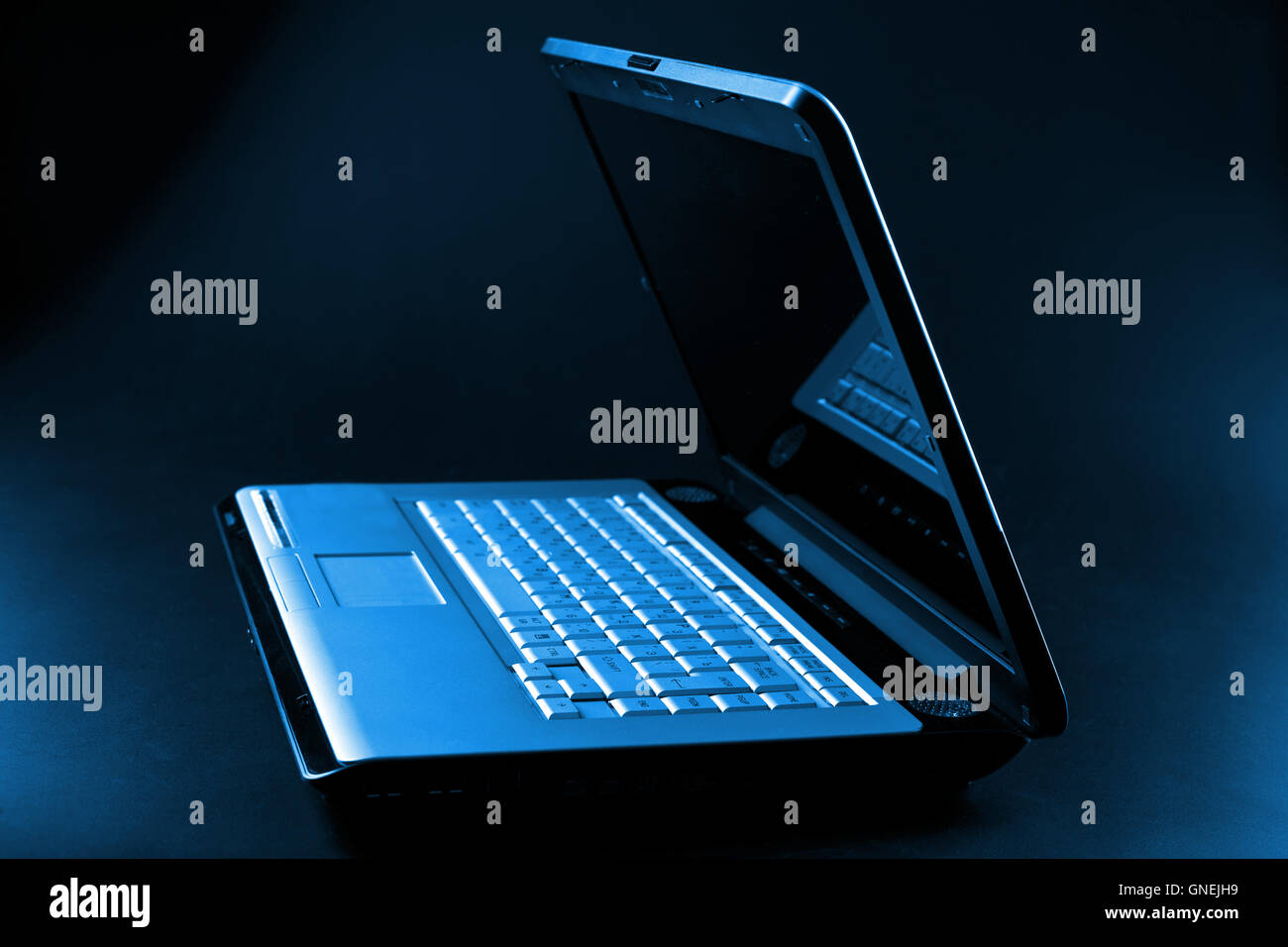 notebook over black background Stock Photo - Alamy