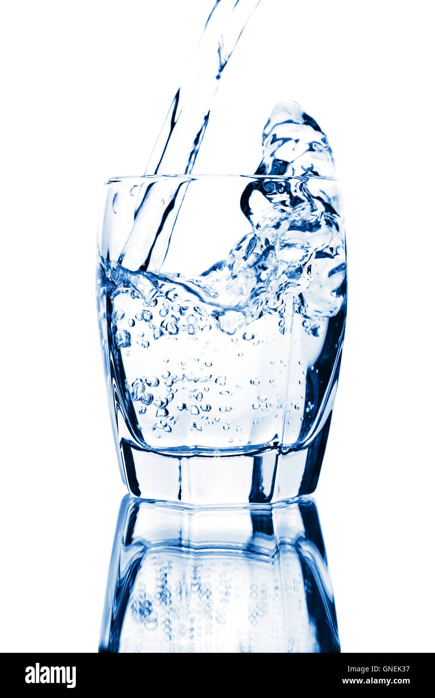 water splashing into glass isolated Stock Photo - Alamy
