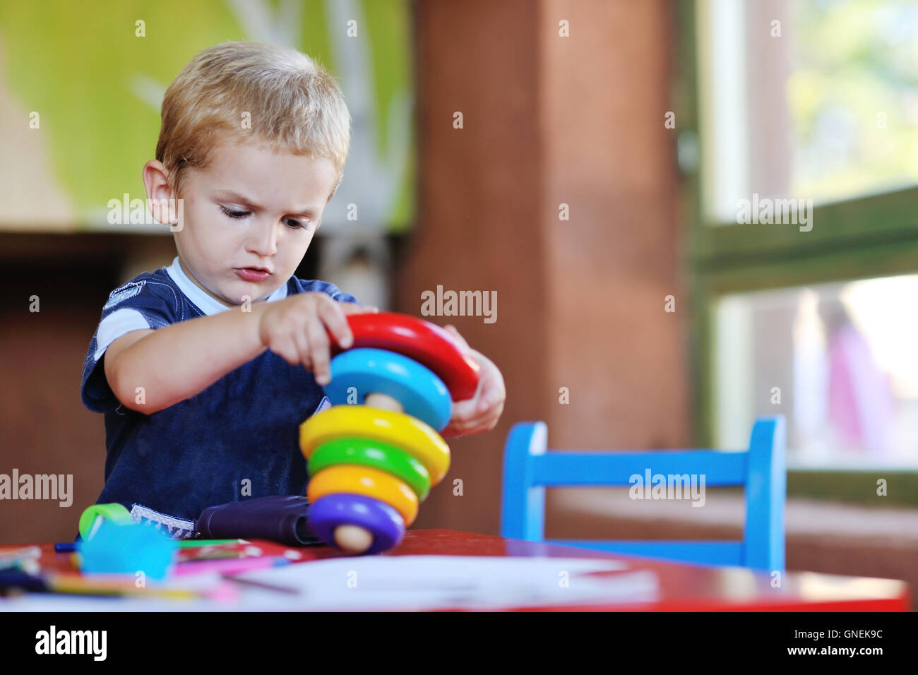 cute little child play and have fun Stock Photo - Alamy