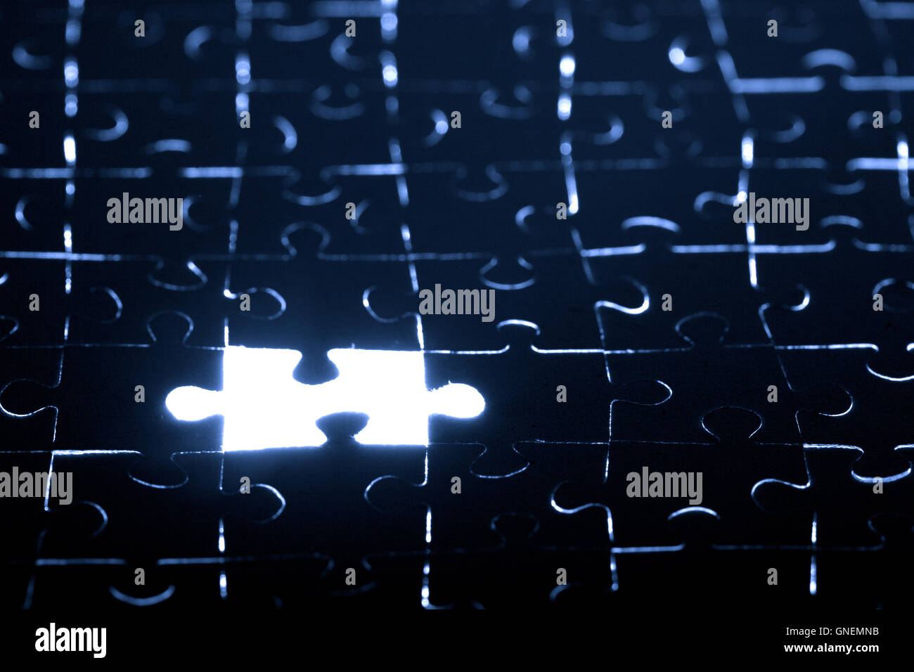 abstract puzzle background with one missing piece Stock Photo - Alamy