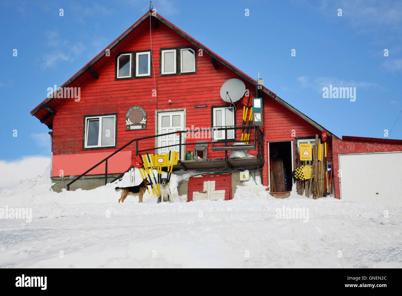 Red house during winter Stock Photo - Alamy