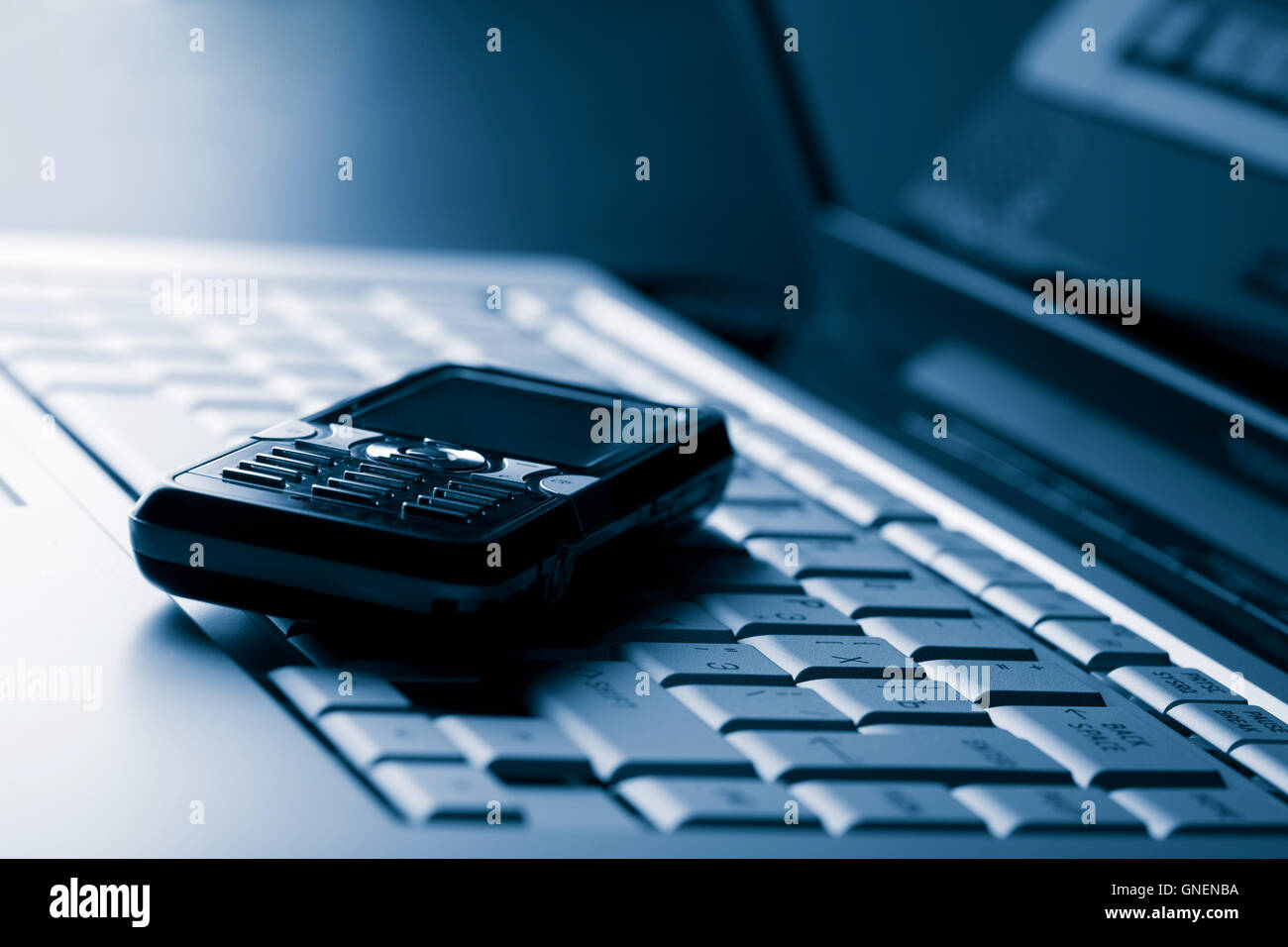 keyboard and mobile phone background Stock Photo - Alamy