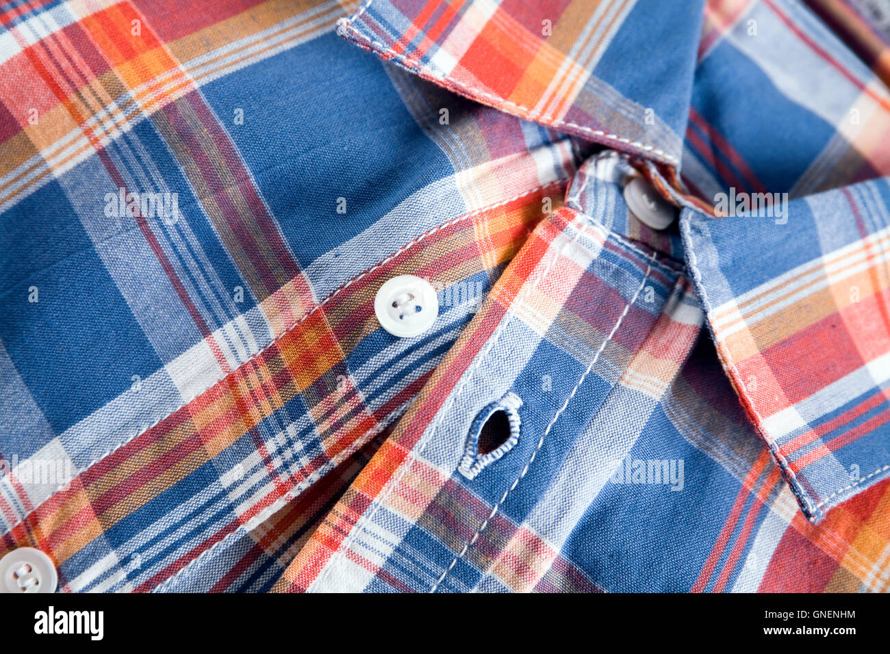 bright multi-colored plaid shirt with a collar Stock Photo - Alamy