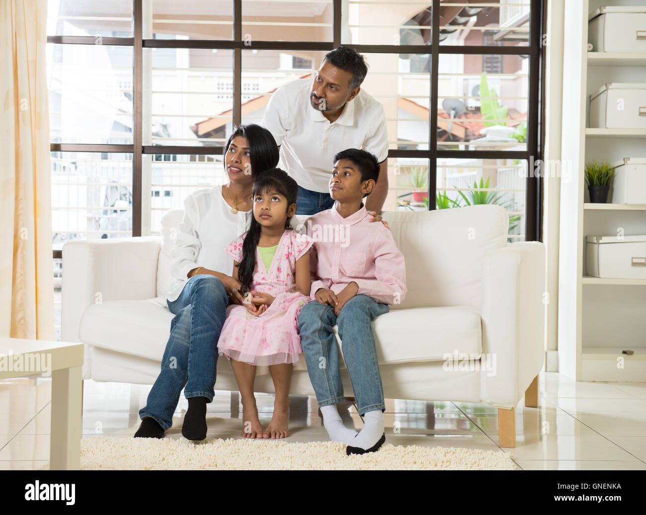 happy indian family at living room Stock Photo - Alamy