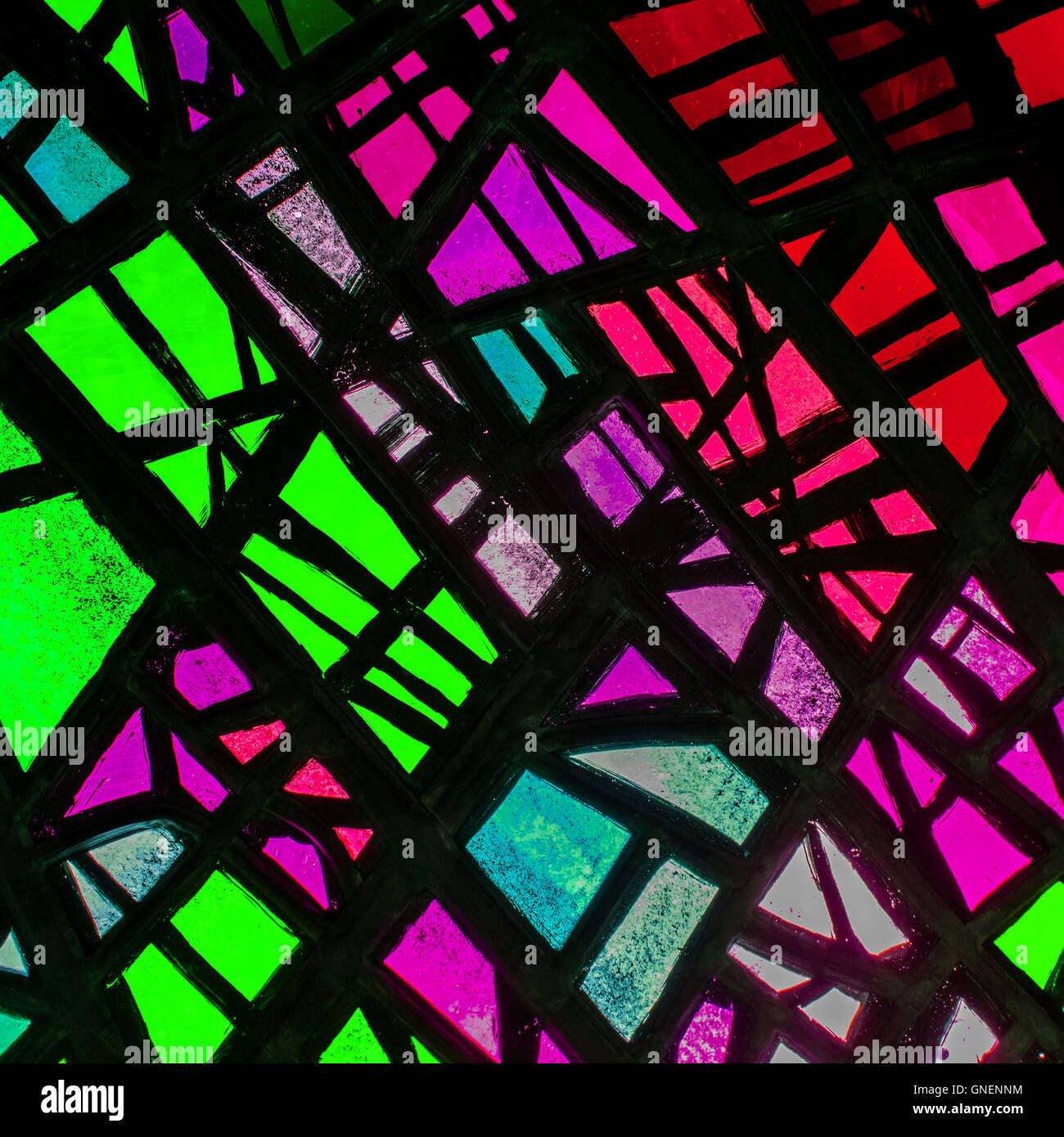 Image of a multicolored stained glass window with irregular block ...