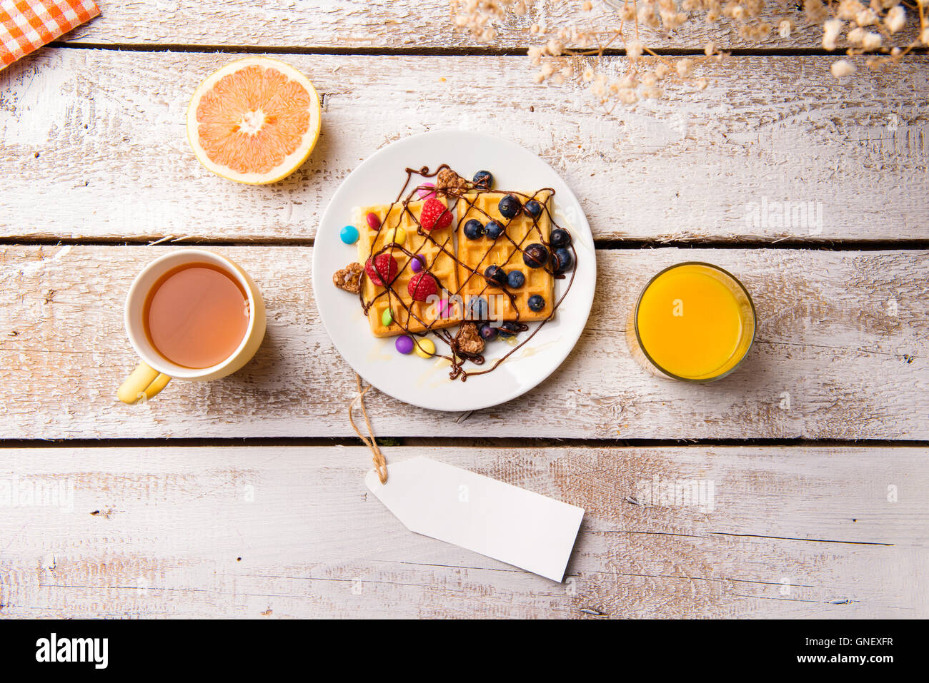 Breakfast meal. Empty tag. Studio shot on wooden background Stock Photo ...