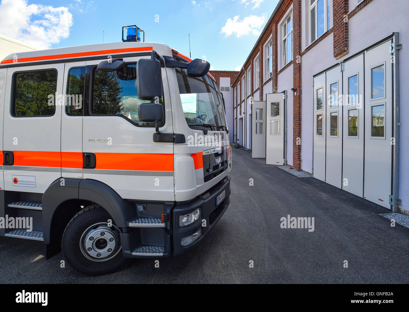 Forst, Germany. 30th Aug, 2016. An emergency vehicle can be seen before ...