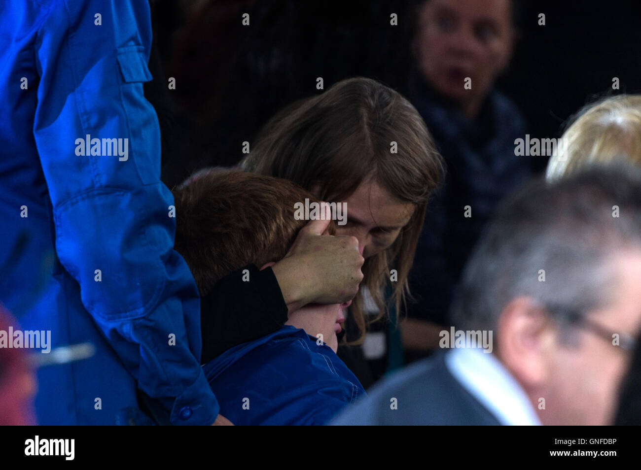 Cry during the funeral hi-res stock photography and images - Alamy