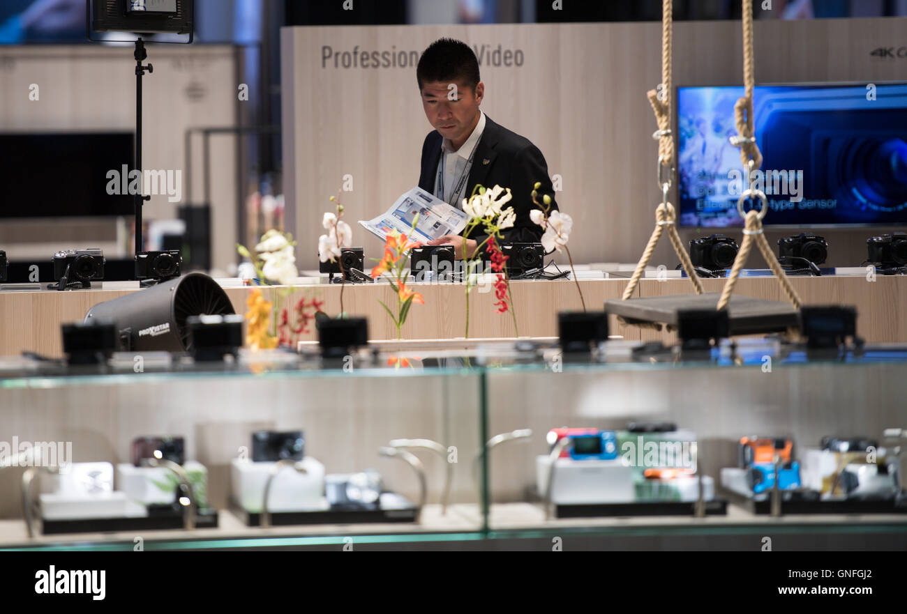 Berlin, Germany. 31st Aug, 2016. Employees prepare the stall of ...