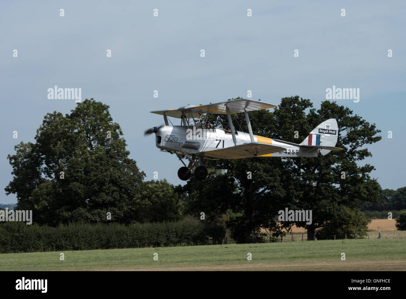 Royal Mail flew a vintage Tiger Moth, carrying a symbolic bag of mail ...