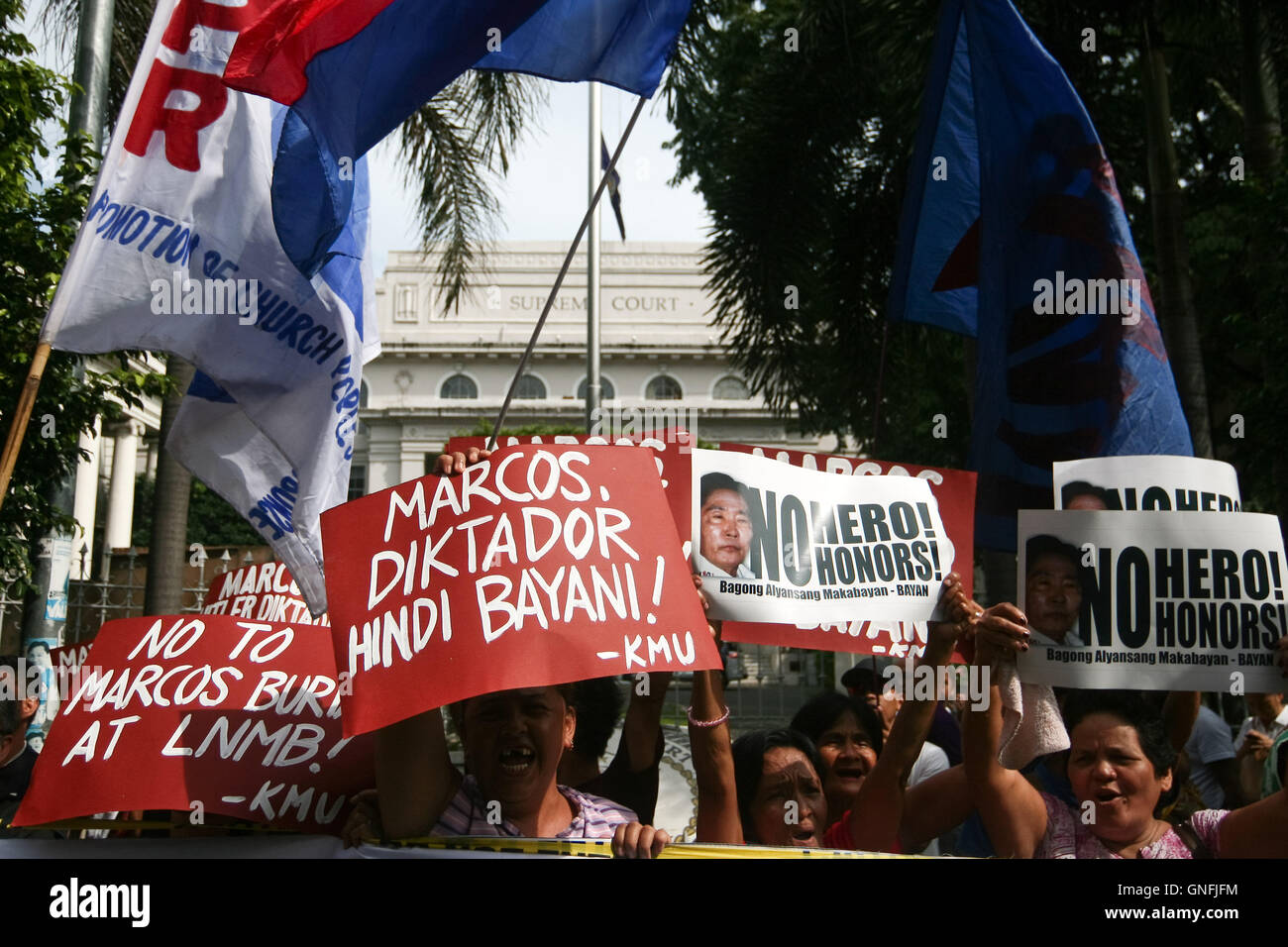 Philippines. 31st Aug, 2016. Anti-Marcos protesters hold posters in ...