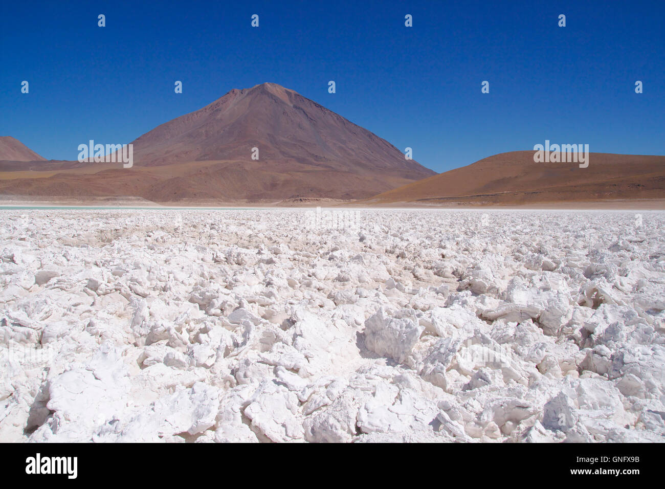 Salt on the shore of Laguna Verde with Licancabur volcano, Bolivia ...