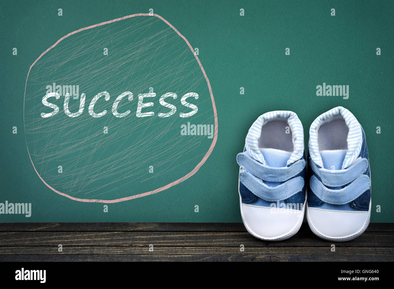 Success text on school table and kid shoes Stock Photo - Alamy