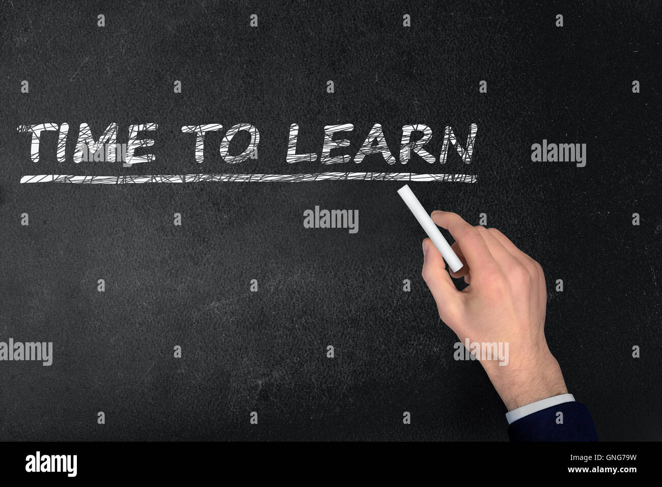 Time to learn text write on black board Stock Photo - Alamy