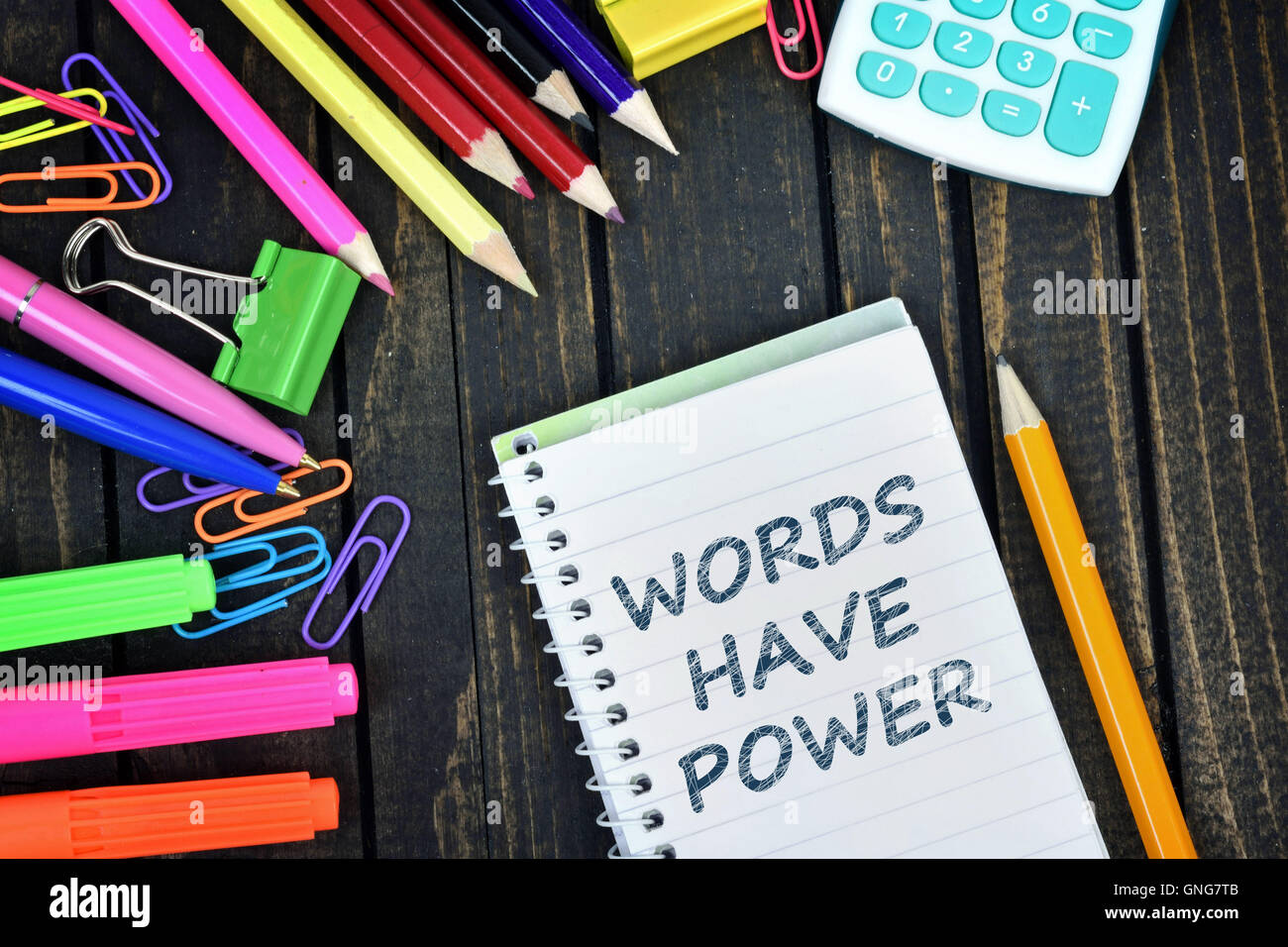 Words have power text on notepad and office tools on wooden table Stock ...