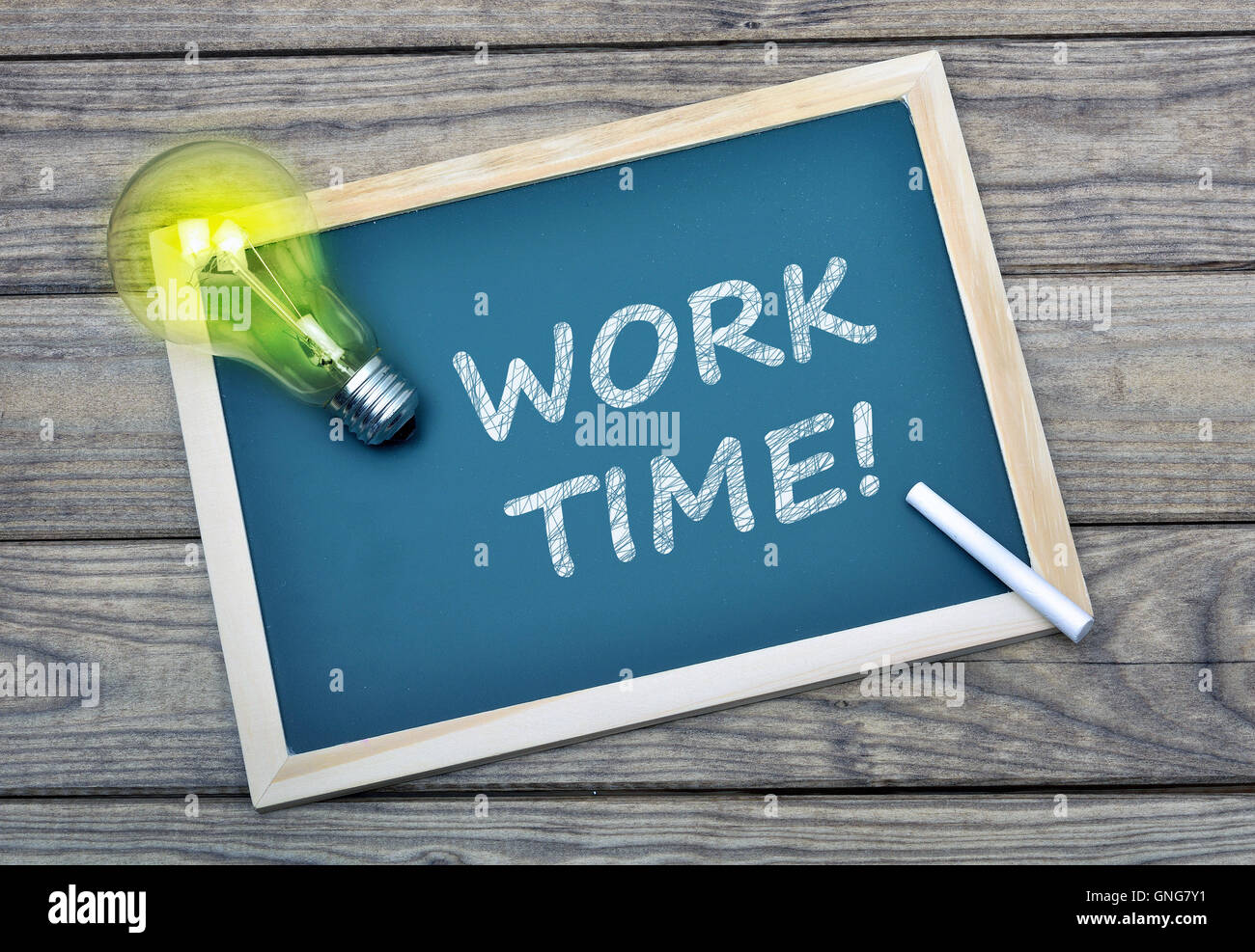 Work Time text on school board and glowing light bulb Stock Photo - Alamy