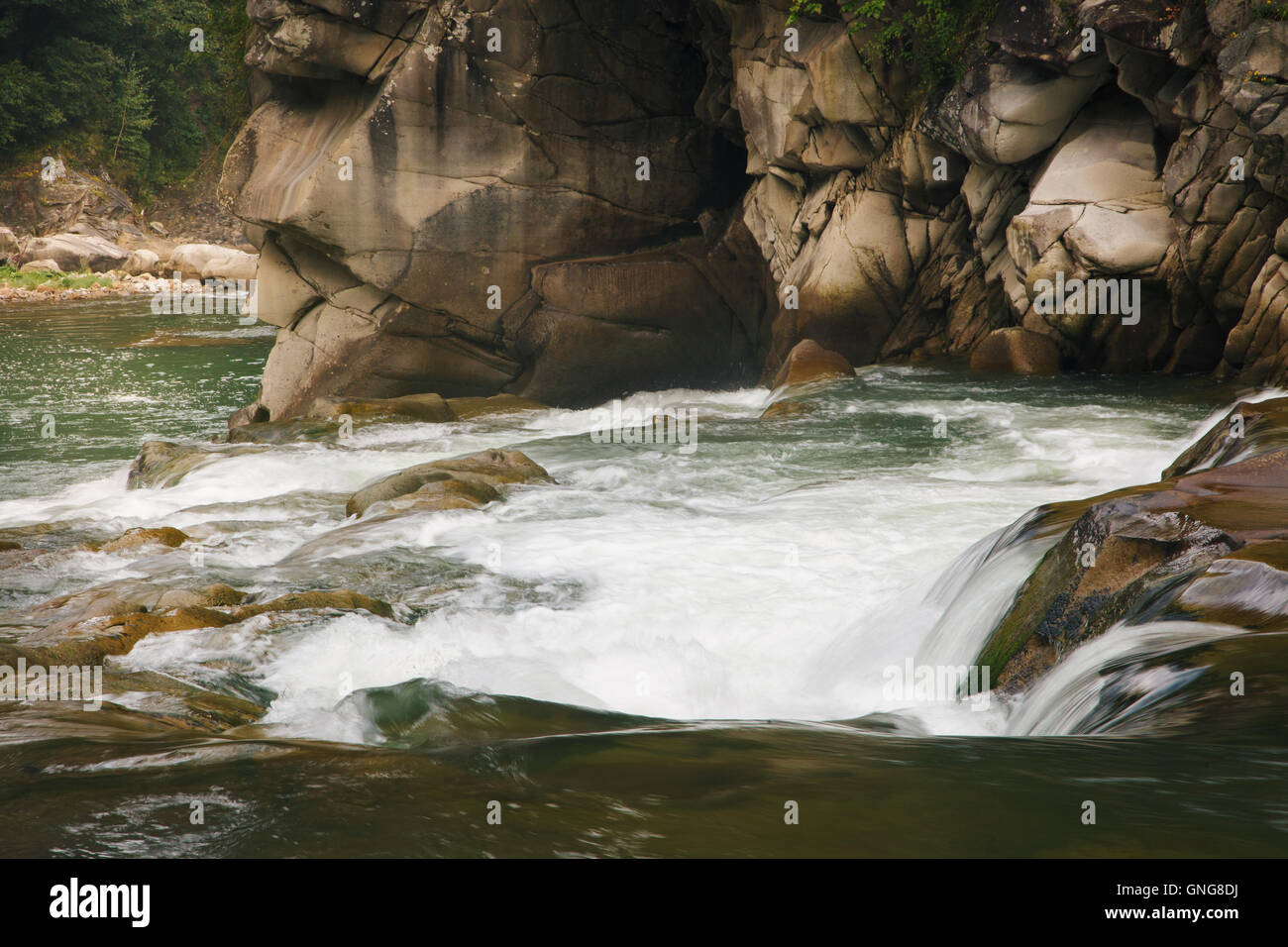 Flowing river mountain natural scenery hi-res stock photography and ...