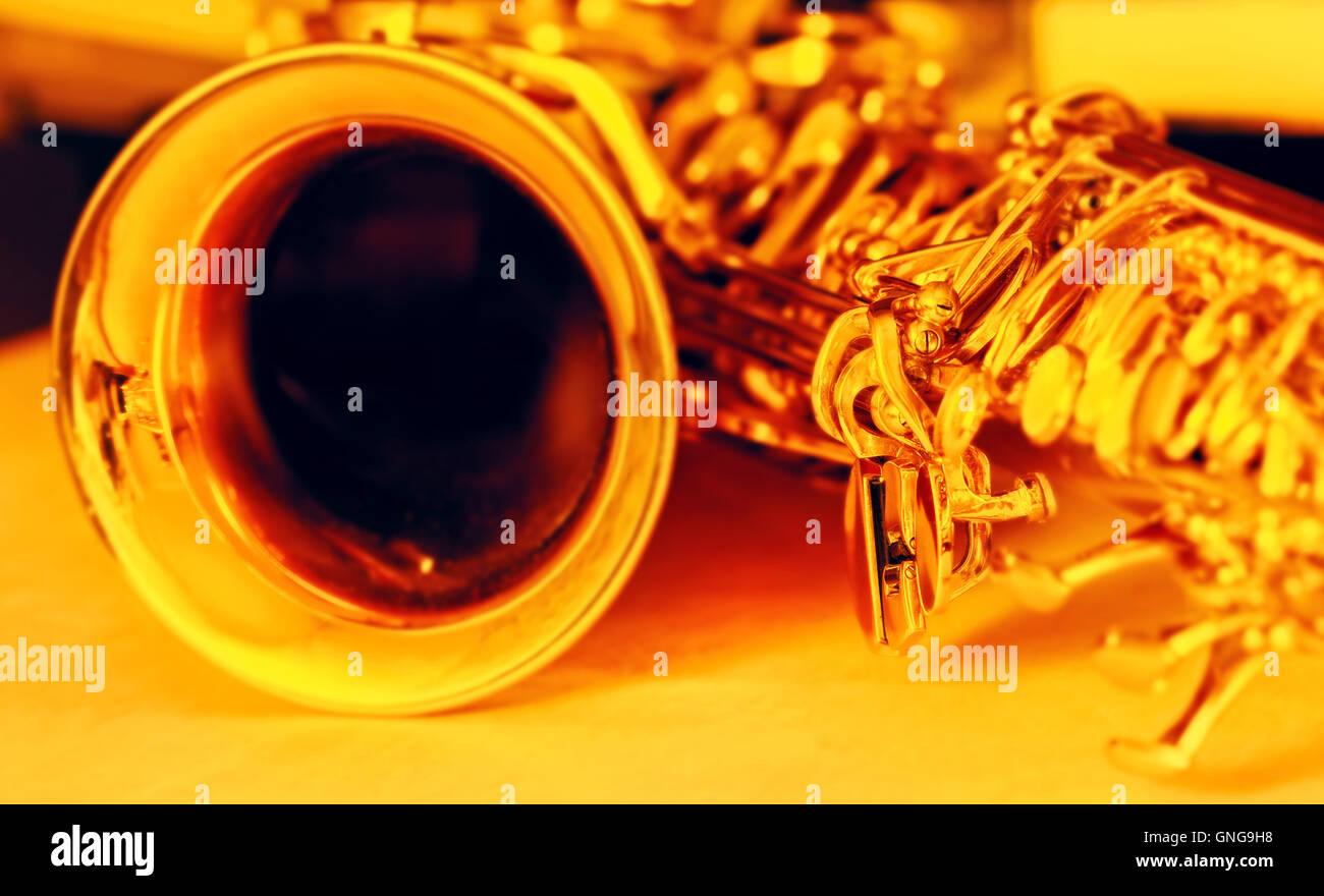 Detail of gold saxophone, romantic musician instrument Stock Photo - Alamy