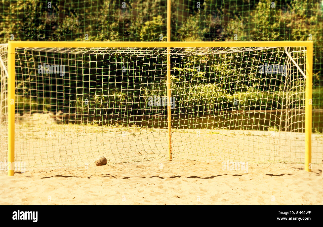 Sports gate with mesh on sandy beach at summer day Stock Photo - Alamy
