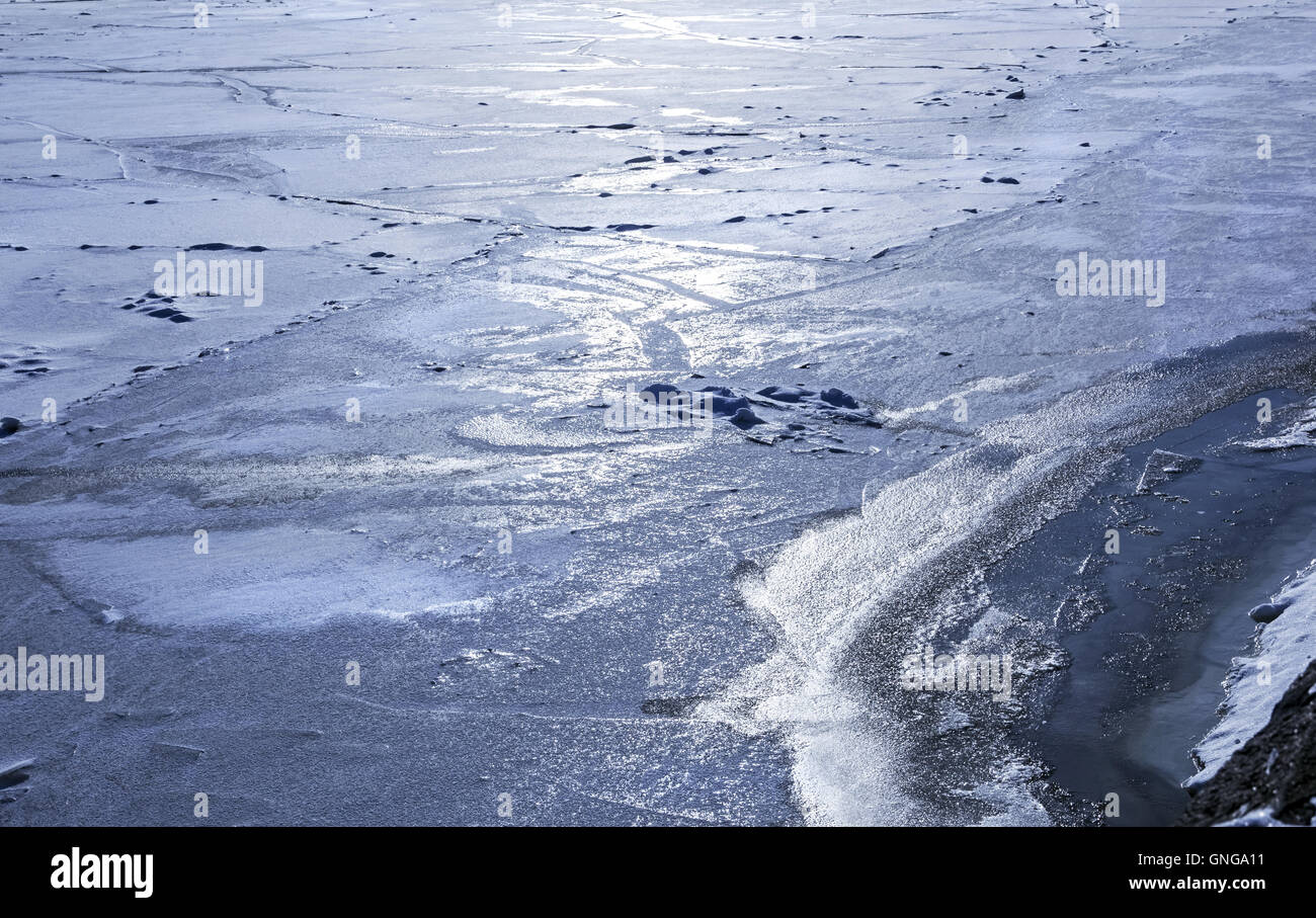 Beautiful winter ice on water at sunny day Stock Photo - Alamy