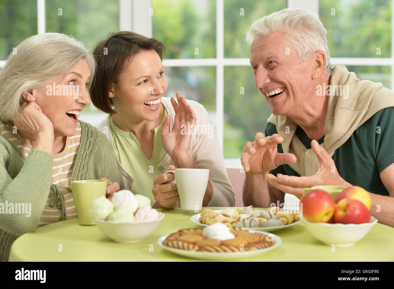 Attractive father adult daughter tea hi-res stock photography and ...