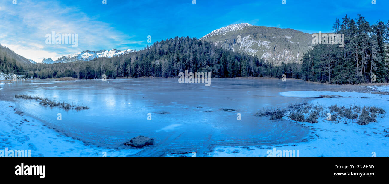 Frozen lake alpine forest hi-res stock photography and images - Alamy