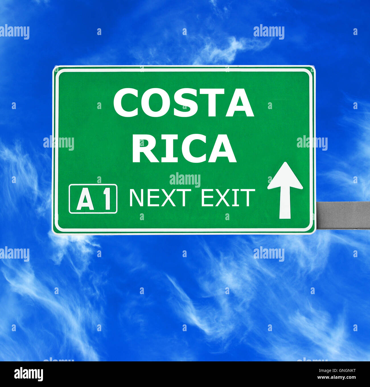 COSTA RICA road sign against clear blue sky Stock Photo - Alamy