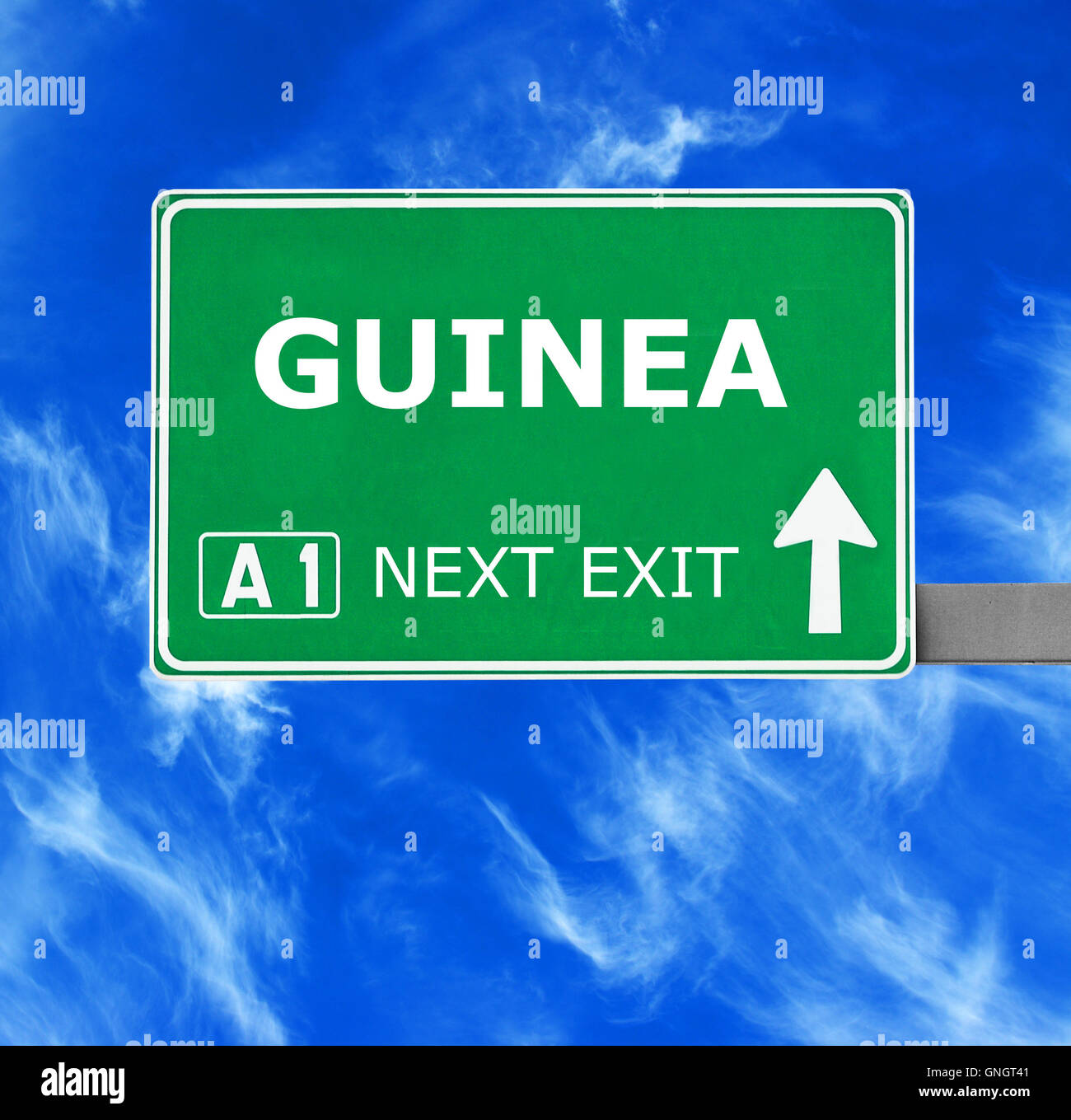 GUINEA road sign against clear blue sky Stock Photo - Alamy