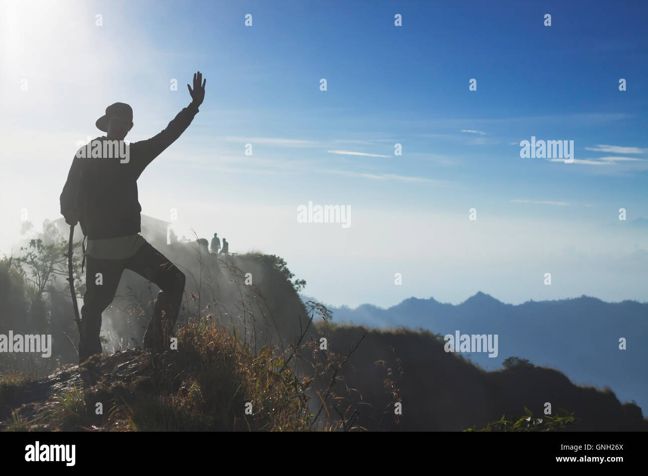 Silhouette man waving hi-res stock photography and images - Alamy