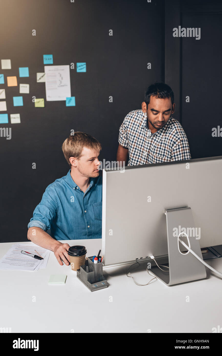 Putting two minds on the task Stock Photo - Alamy