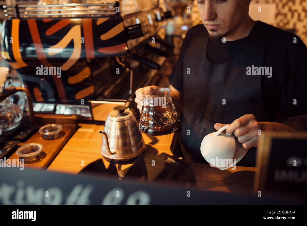 Work at a coffee shop hi-res stock photography and images - Alamy
